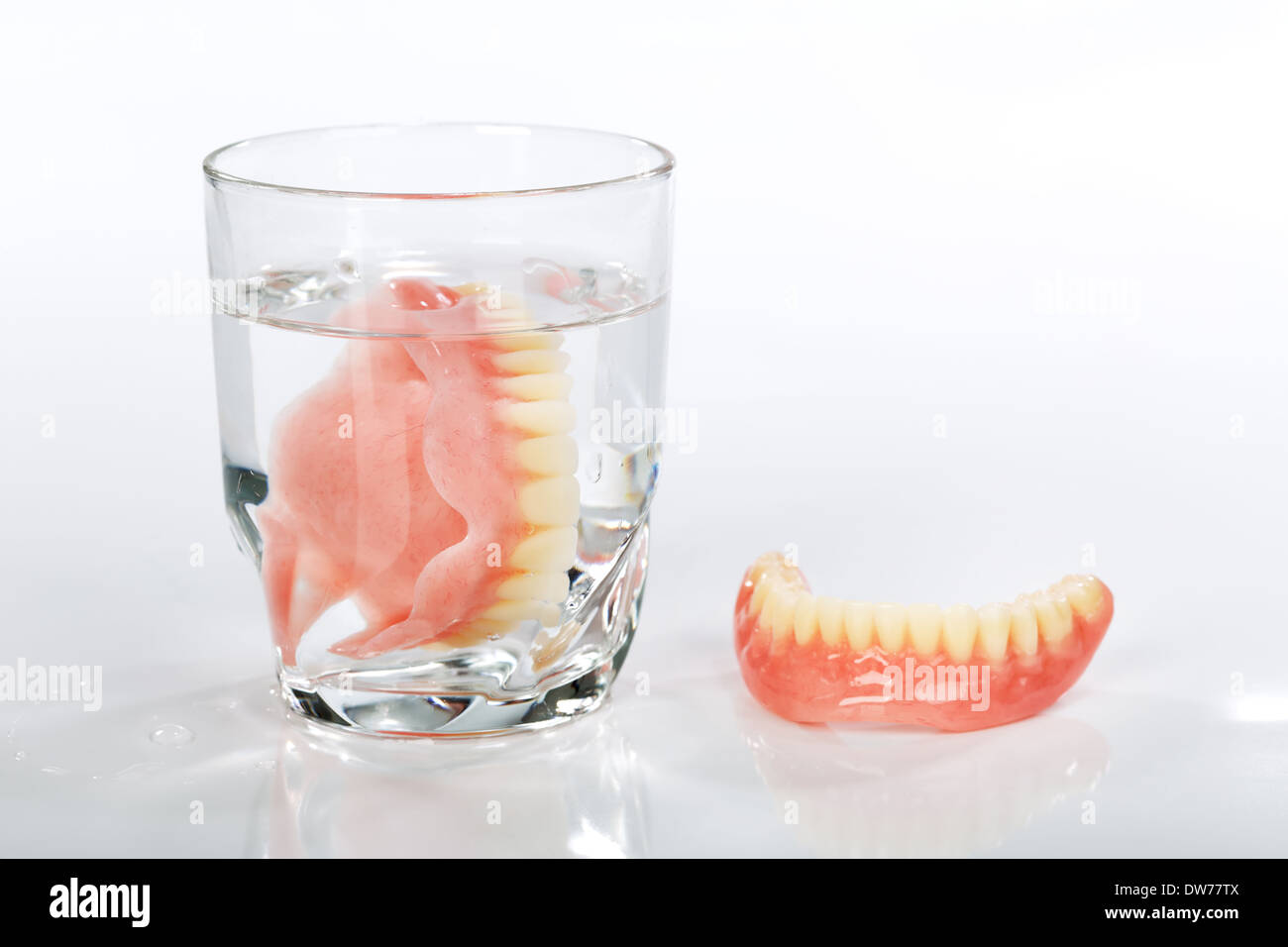 Set dentures in glass water hi-res stock photography and images - Alamy