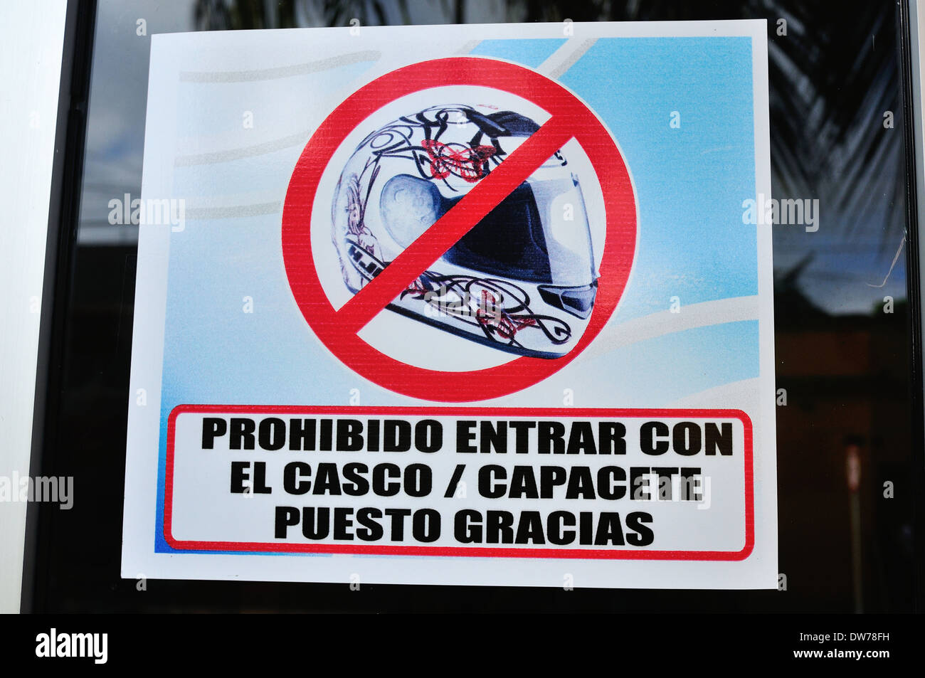 Shop - Prohibited entry sign with helmet in Spanish and Portuguese ...