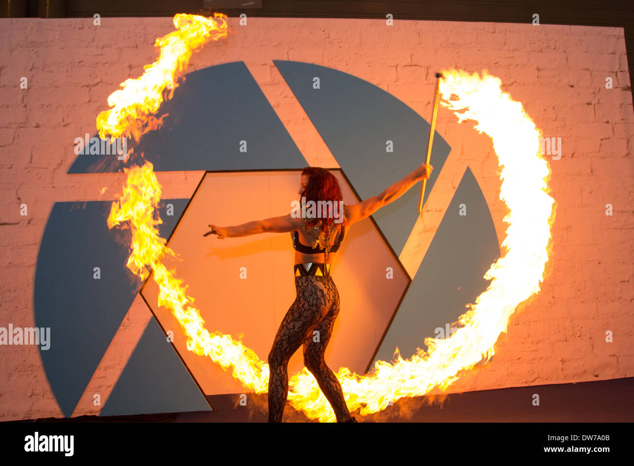 Fire artist on stage during the photography show at the NEC in ...