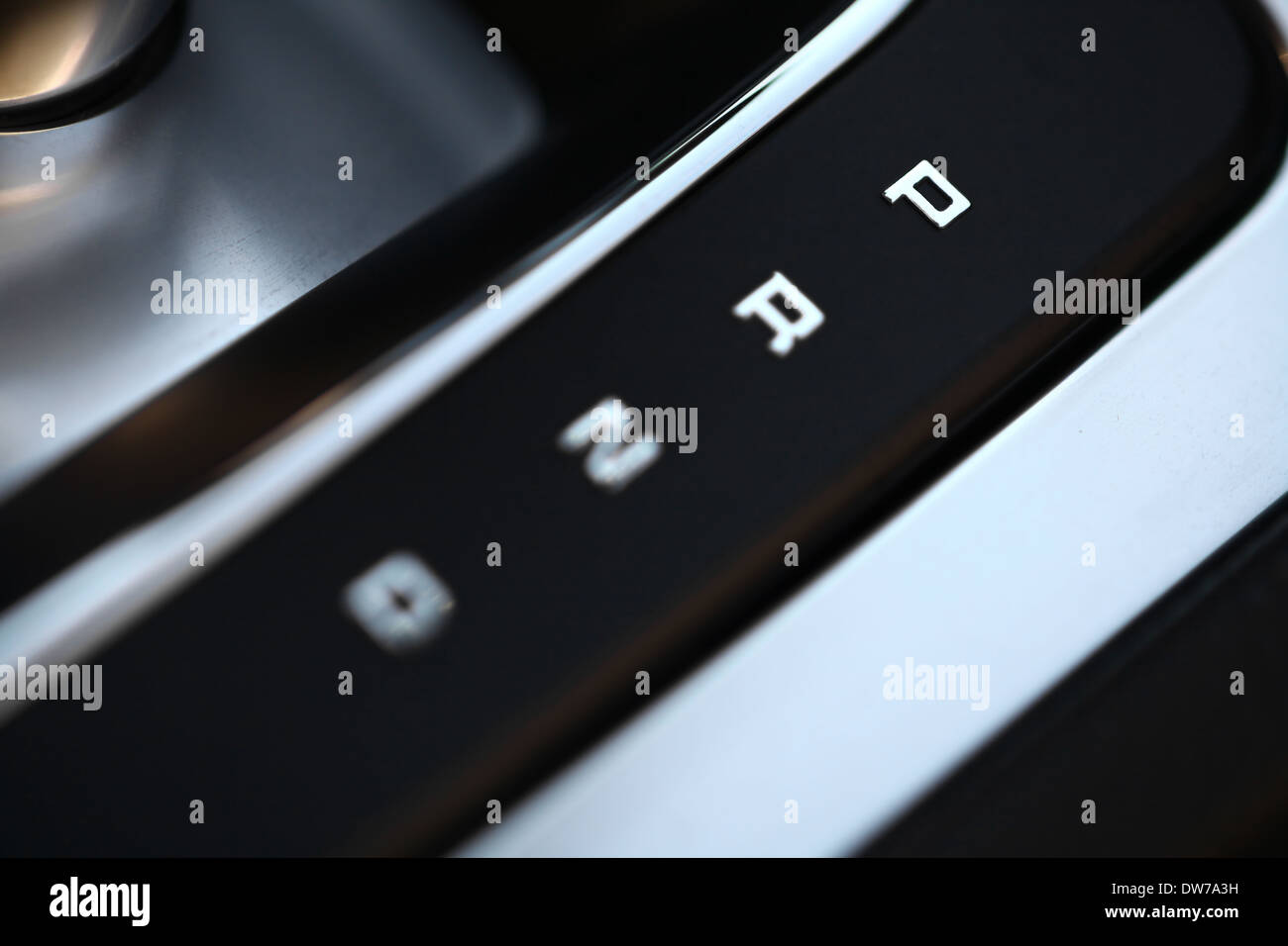 Close-up shot of the positions of an automatic gear shifter in a car ...