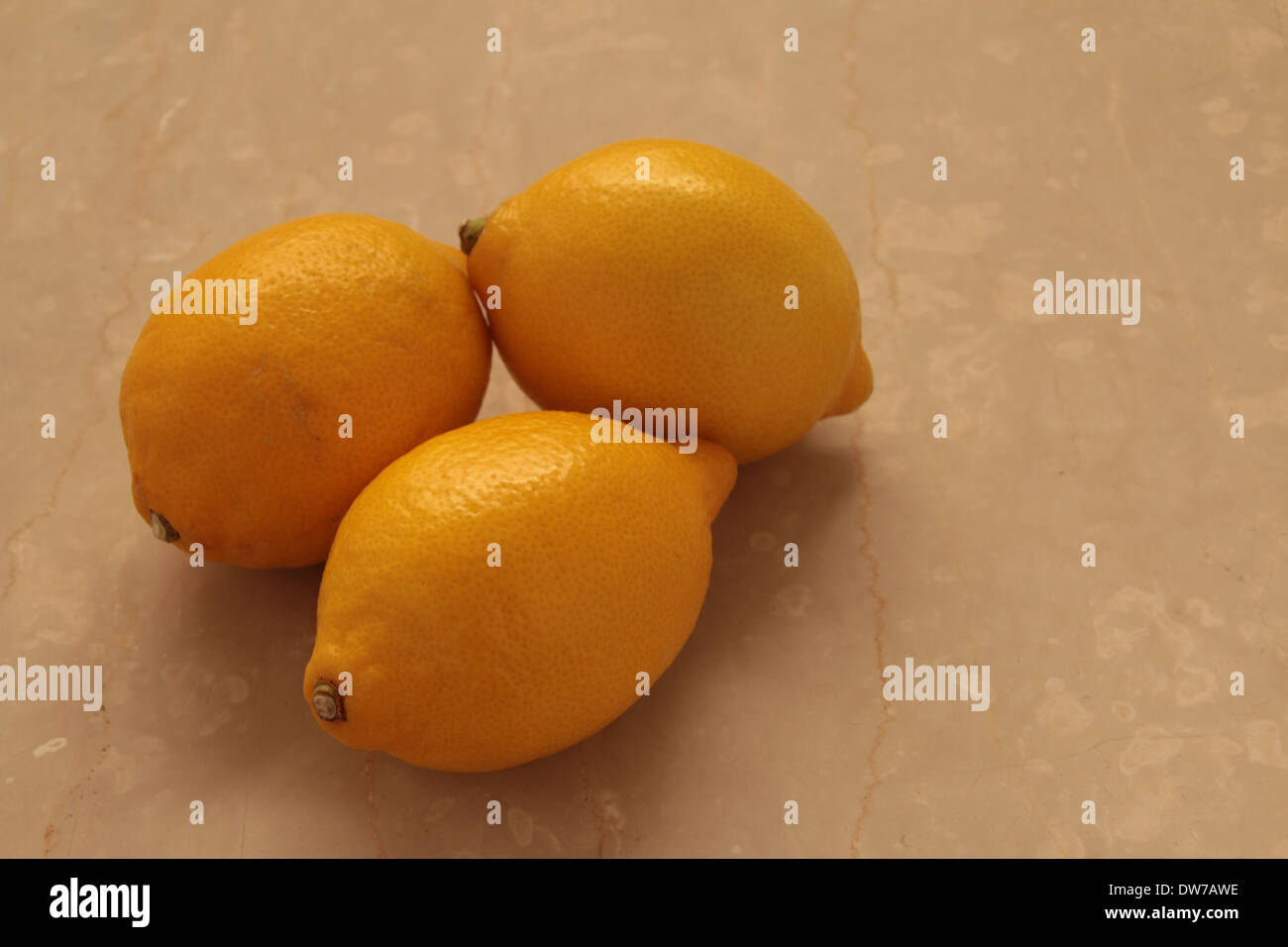 Limes 3 citrus fruit cream marble with space to the right Stock Photo ...