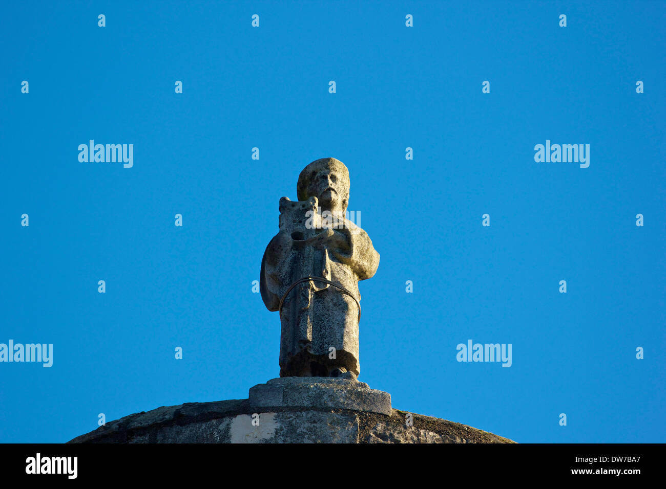 Stone carved figure on top of grade 1 listed 14th-century gatehouse ...