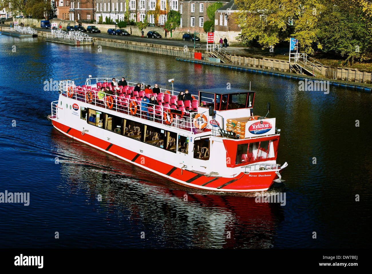 Sunlit tourist cruise riverboat on river Ouse York north Yorkshire ...