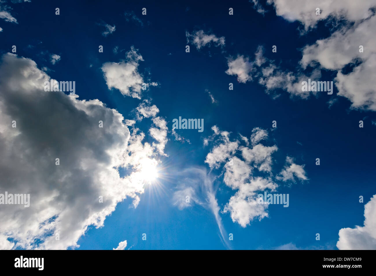 cosmic blue sky and bright sun Stock Photo - Alamy