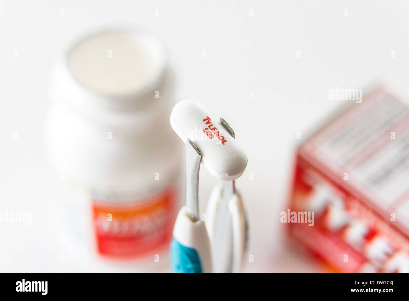 Tylenol pill and container with safety seal Stock Photo - Alamy
