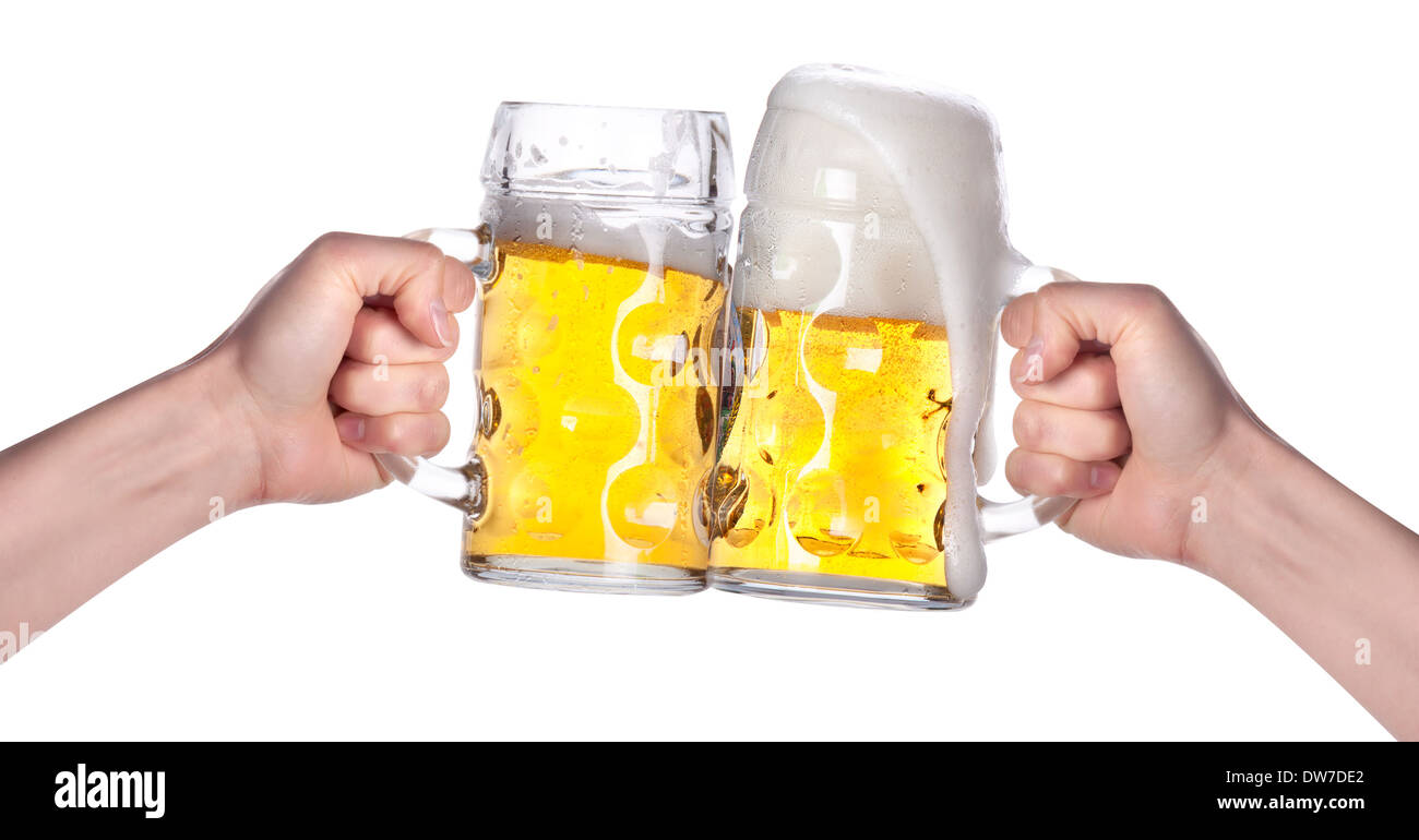 two hands holding beers making a toast Stock Photo - Alamy