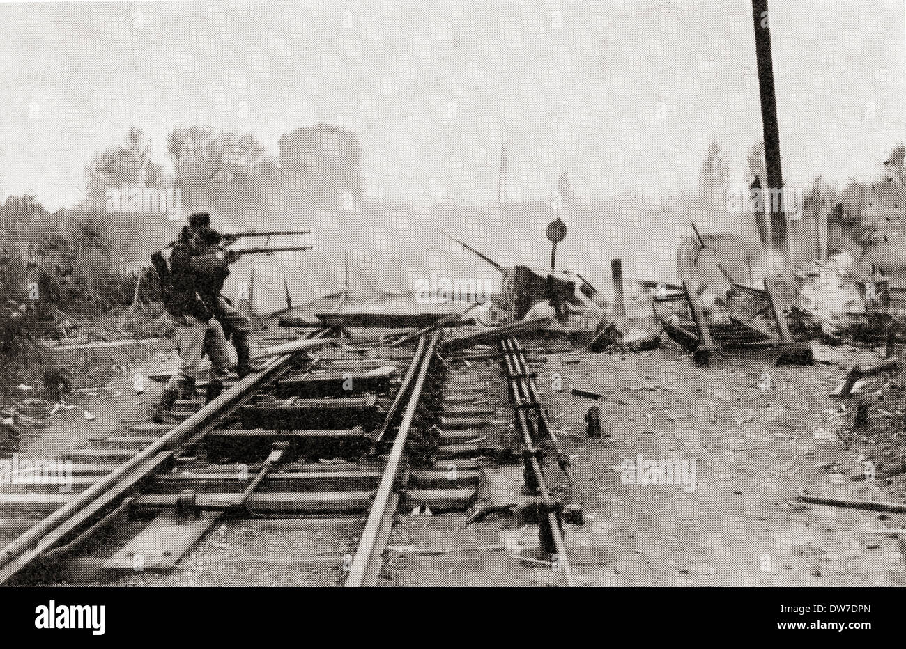 Belgian snipers fire on the German enemy in Termonde, Belgium during ...