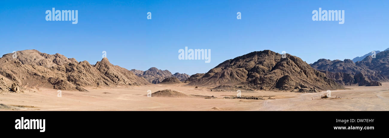 Desert with hills, blue sky, panorama, Egypt Stock Photo - Alamy
