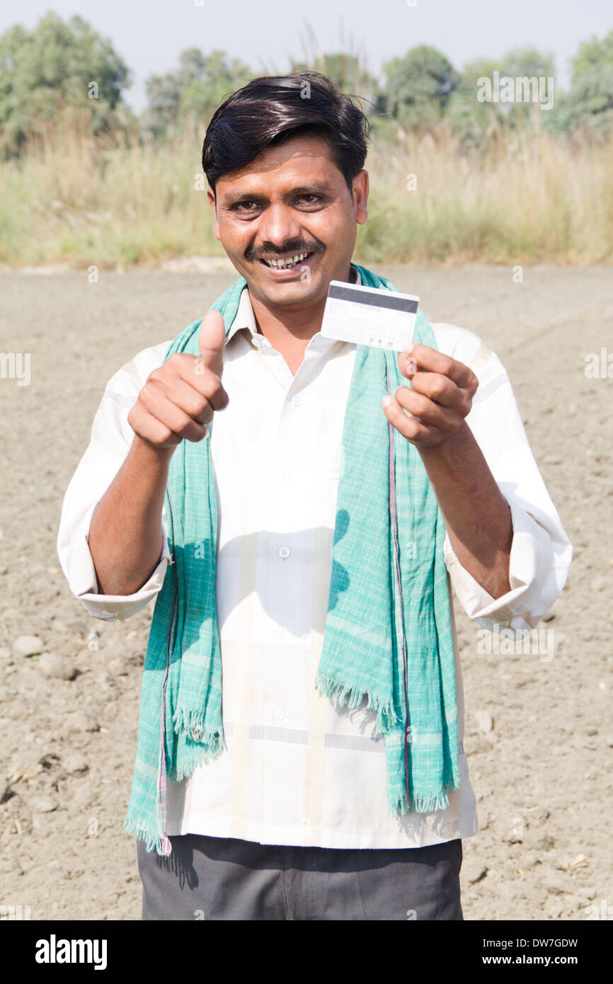 1 indian farmar showing credit card Stock Photo - Alamy