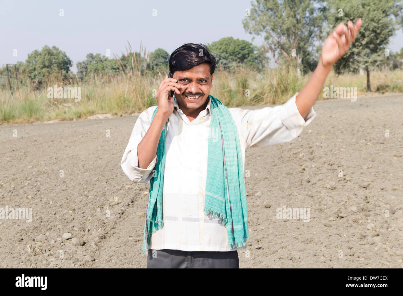 indian village farmer taking mobile Stock Photo - Alamy