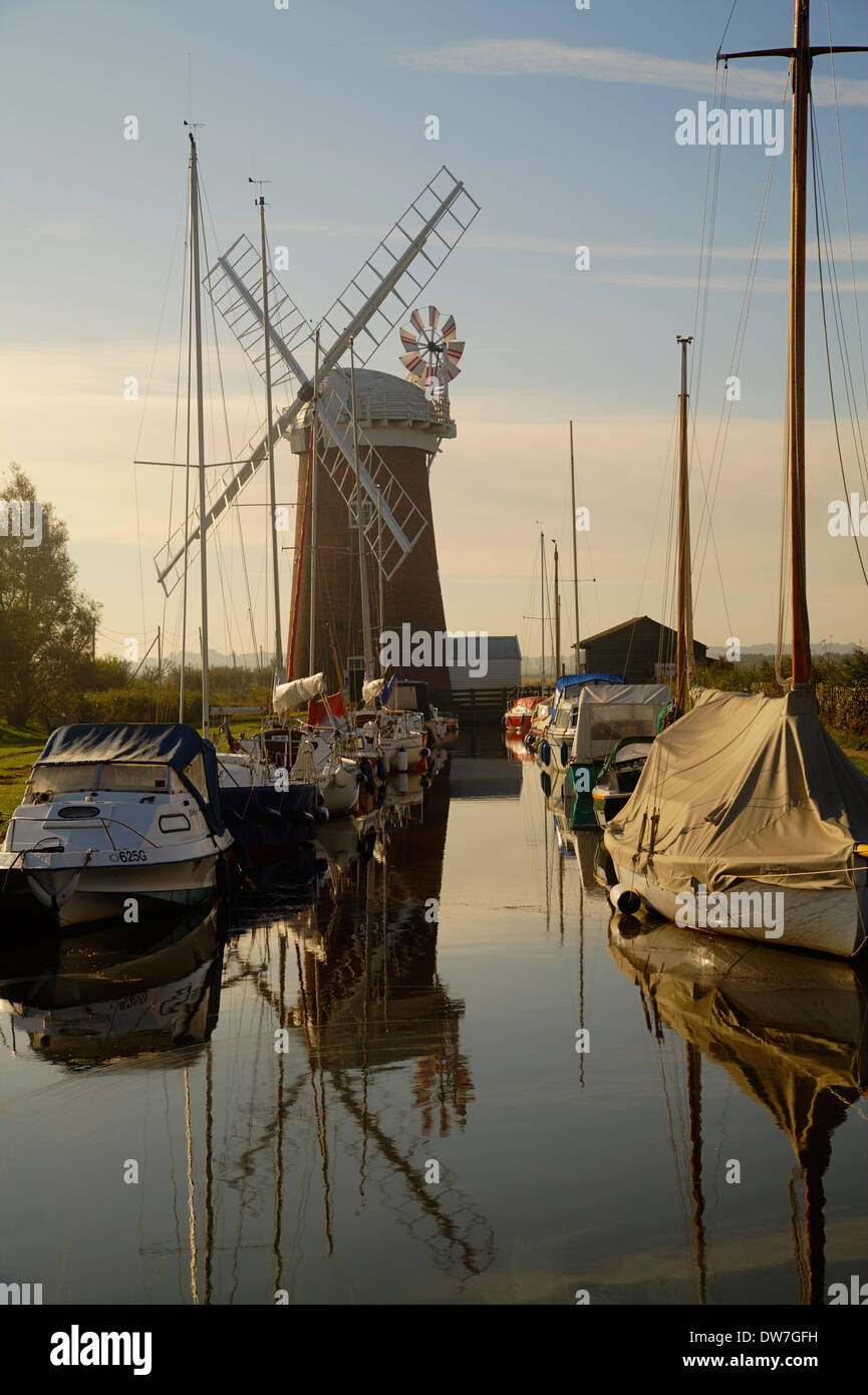 Golden glow as the sun rises on Horsey Mill located in the county of ...