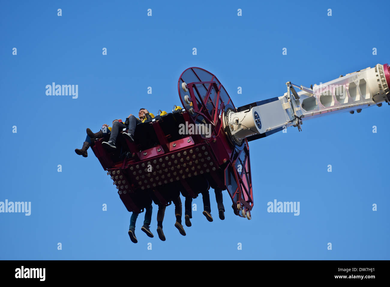 Claw which is a ride that spins people upside down. a carnival ride on ...