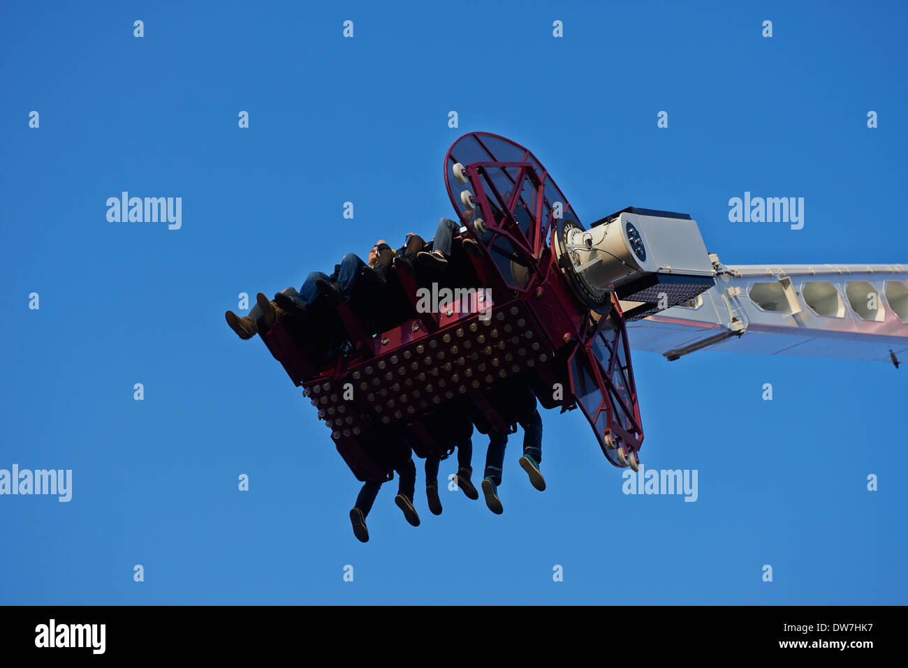 Claw which is a ride that spins people upside down. a carnival ride on ...