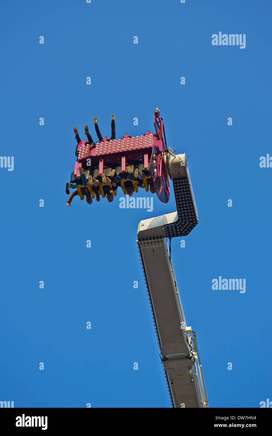 Claw which is a ride that spins people upside down. a carnival ride on ...