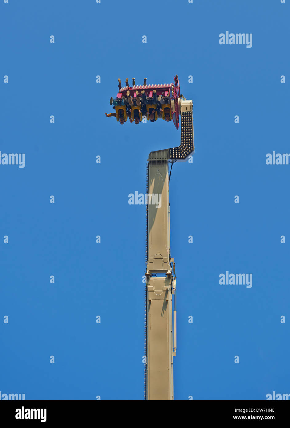 Claw which is a ride that spins people upside down. a carnival ride on ...