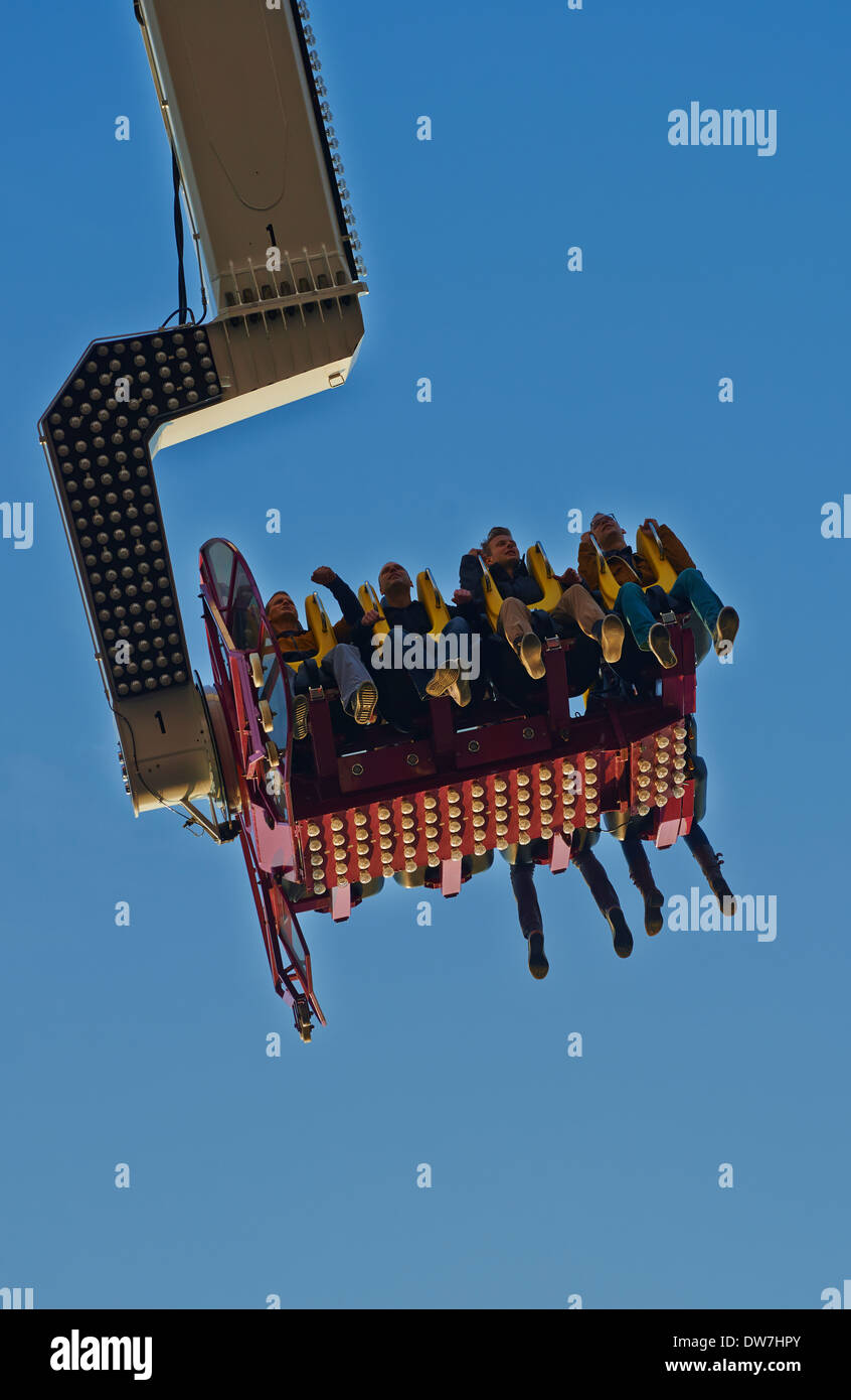 Claw which is a ride that spins people upside down. a carnival ride on ...
