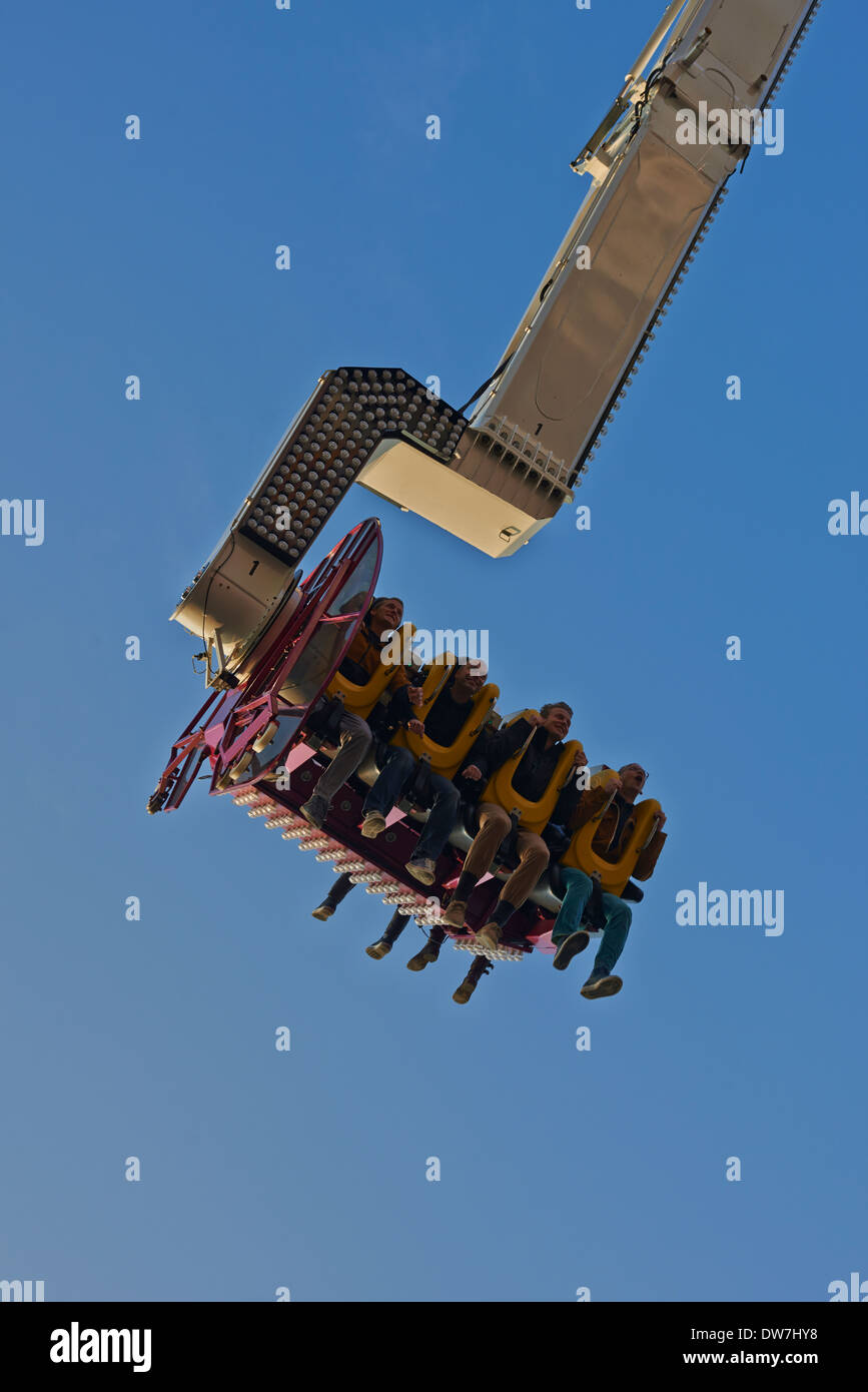 Claw which is a ride that spins people upside down. a carnival ride on ...