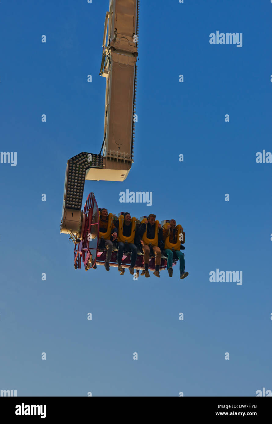 Claw which is a ride that spins people upside down. a carnival ride on ...