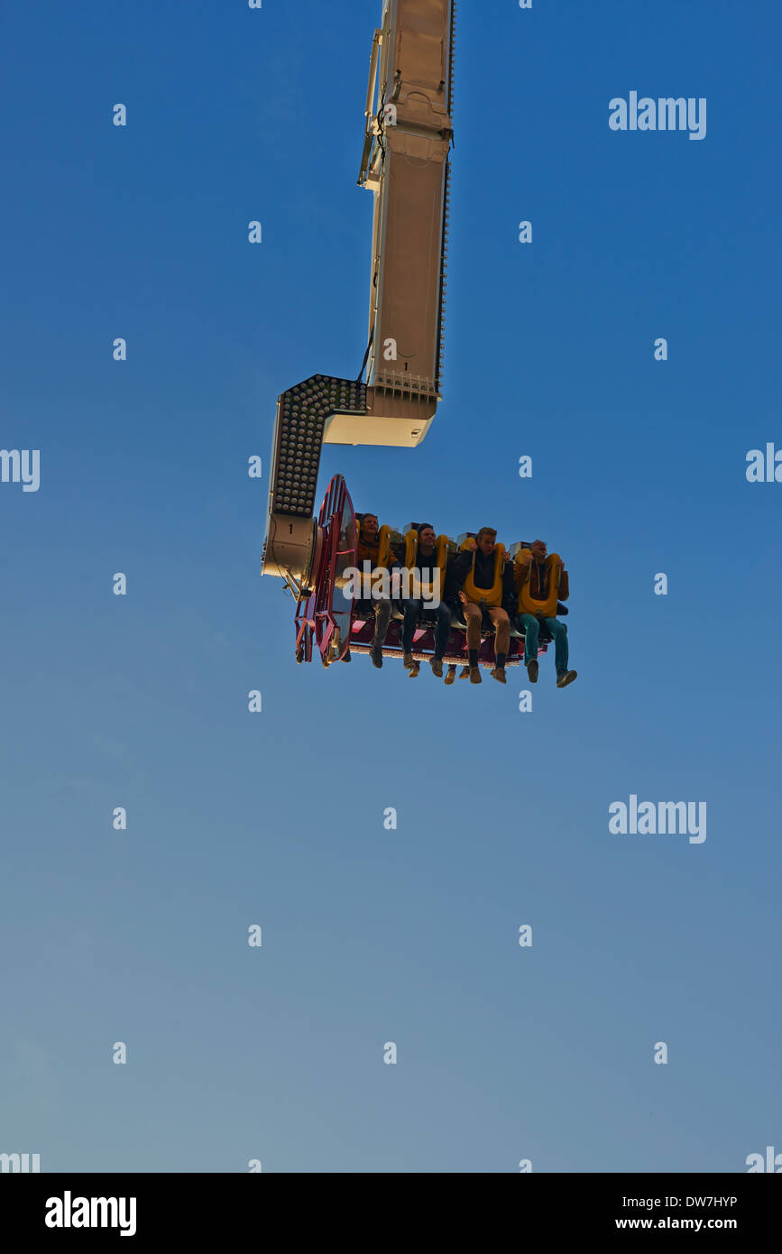 Claw which is a ride that spins people upside down. a carnival ride on ...