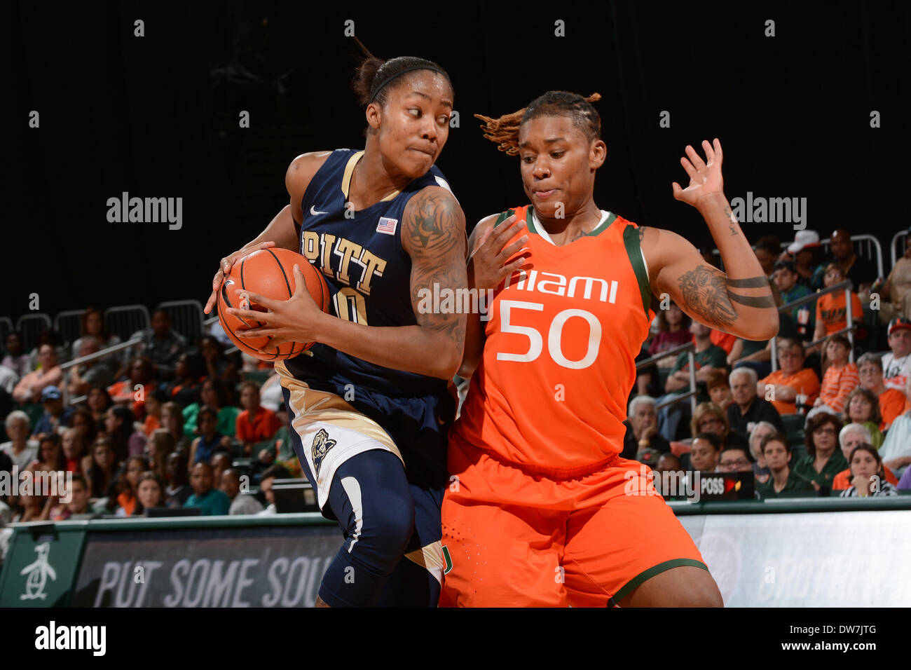 March 2, 2014: Asia Logan #0 of Pittsburgh drives on Maria Brown #50 of ...