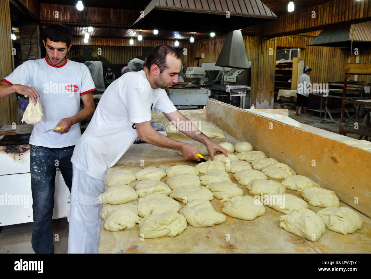 Men bake bread in market's bakery, Spitak, Armenia Stock Photo - Alamy