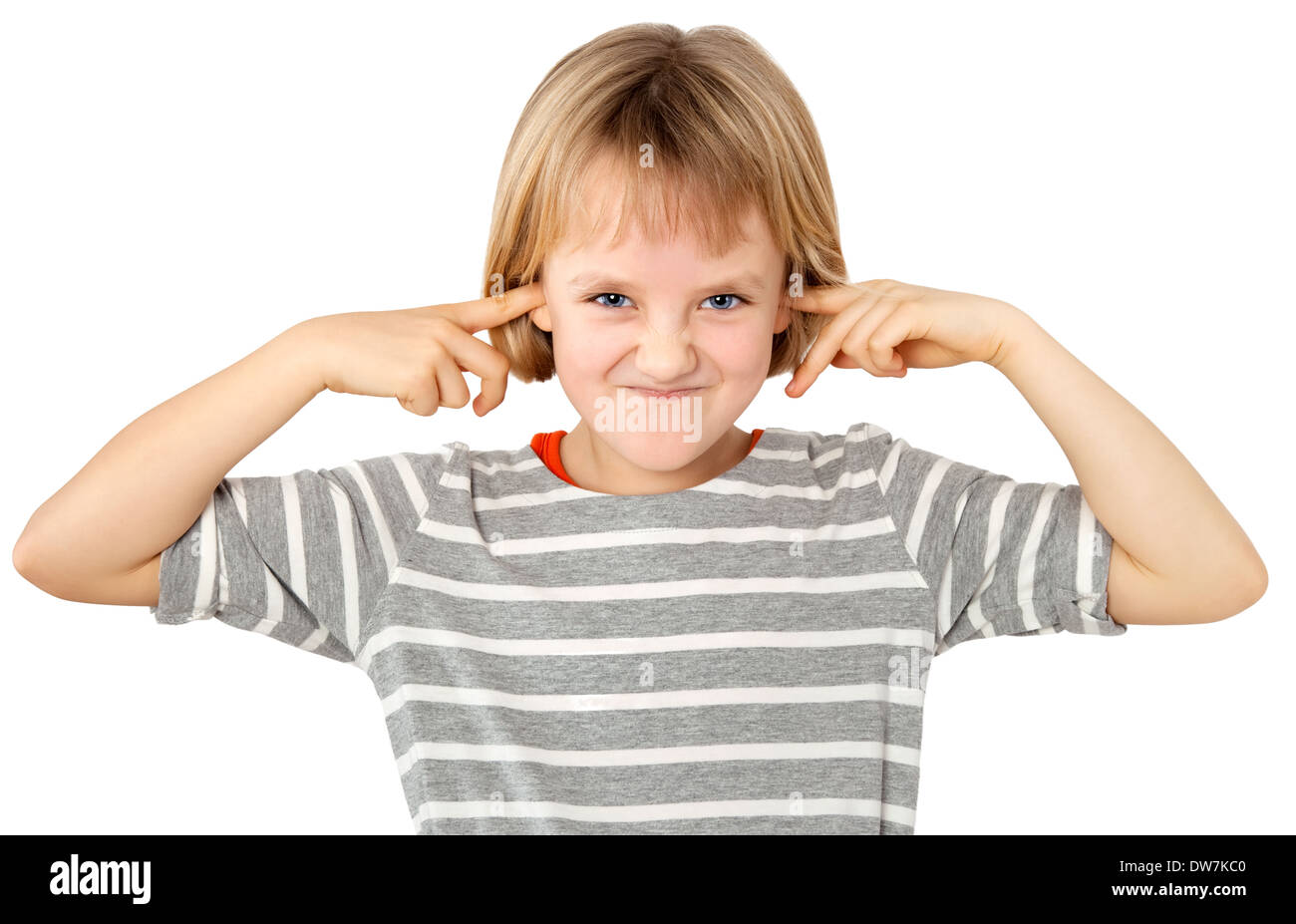 little girl is closing her ears with her fingers Stock Photo - Alamy