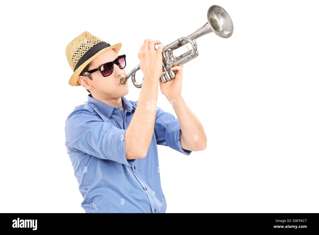 Blowing trumpet hi-res stock photography and images - Alamy