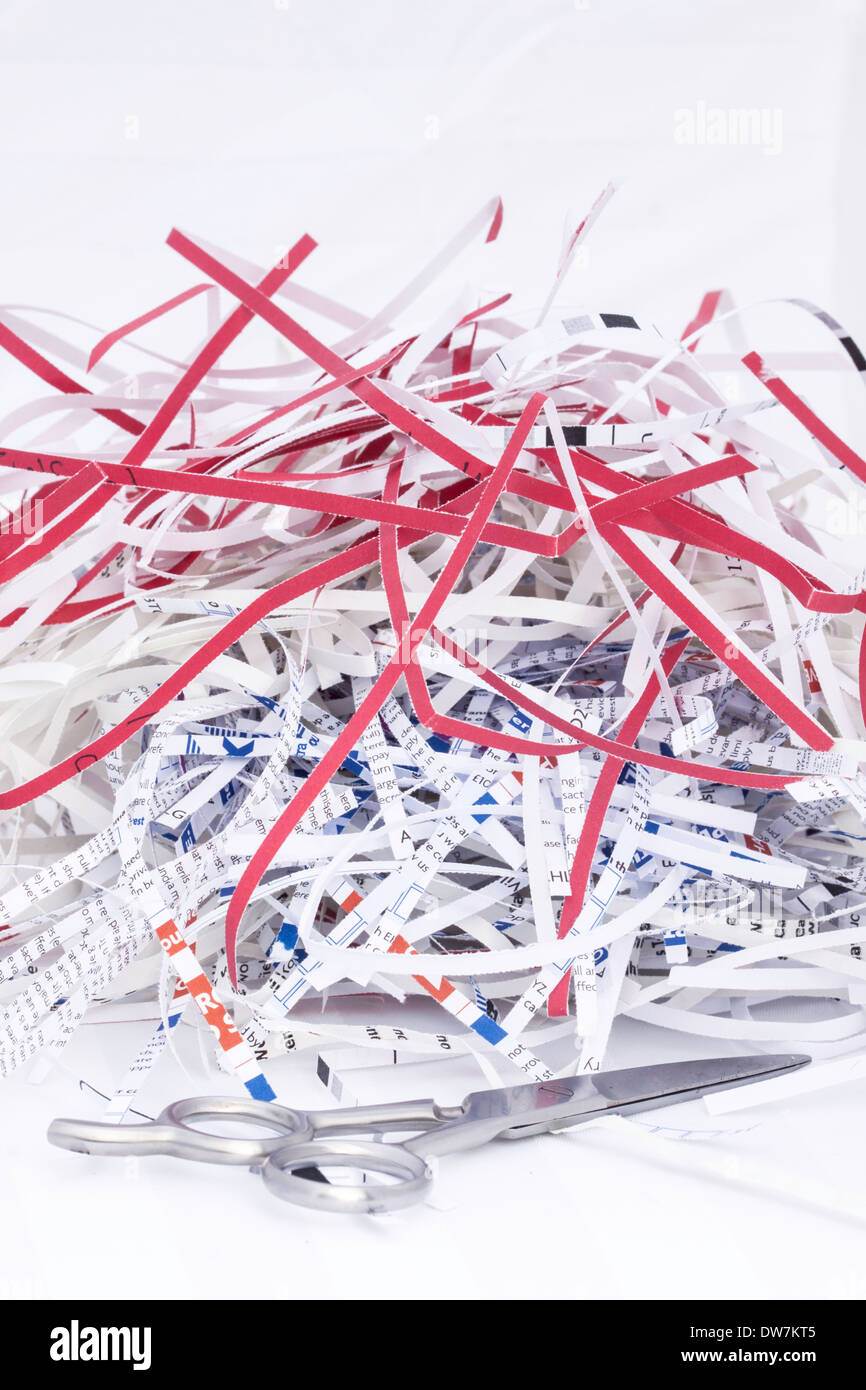 Shredded paper with scissors Stock Photo - Alamy