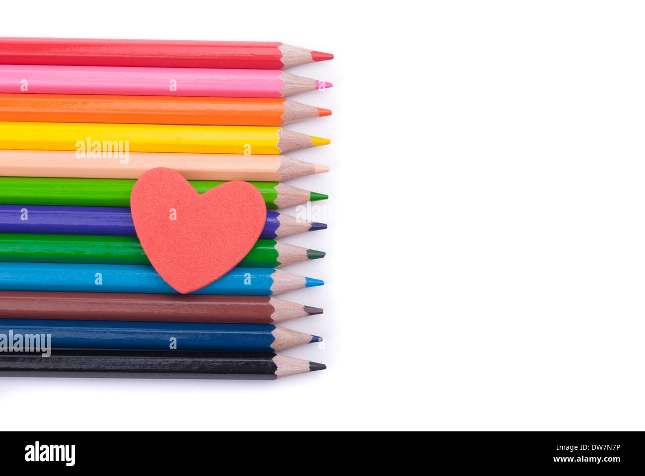 Paper heart on colored pencils Stock Photo - Alamy
