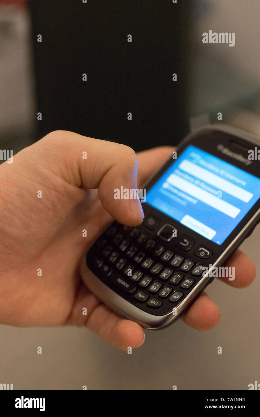 phone hand holding using new illumination Stock Photo - Alamy