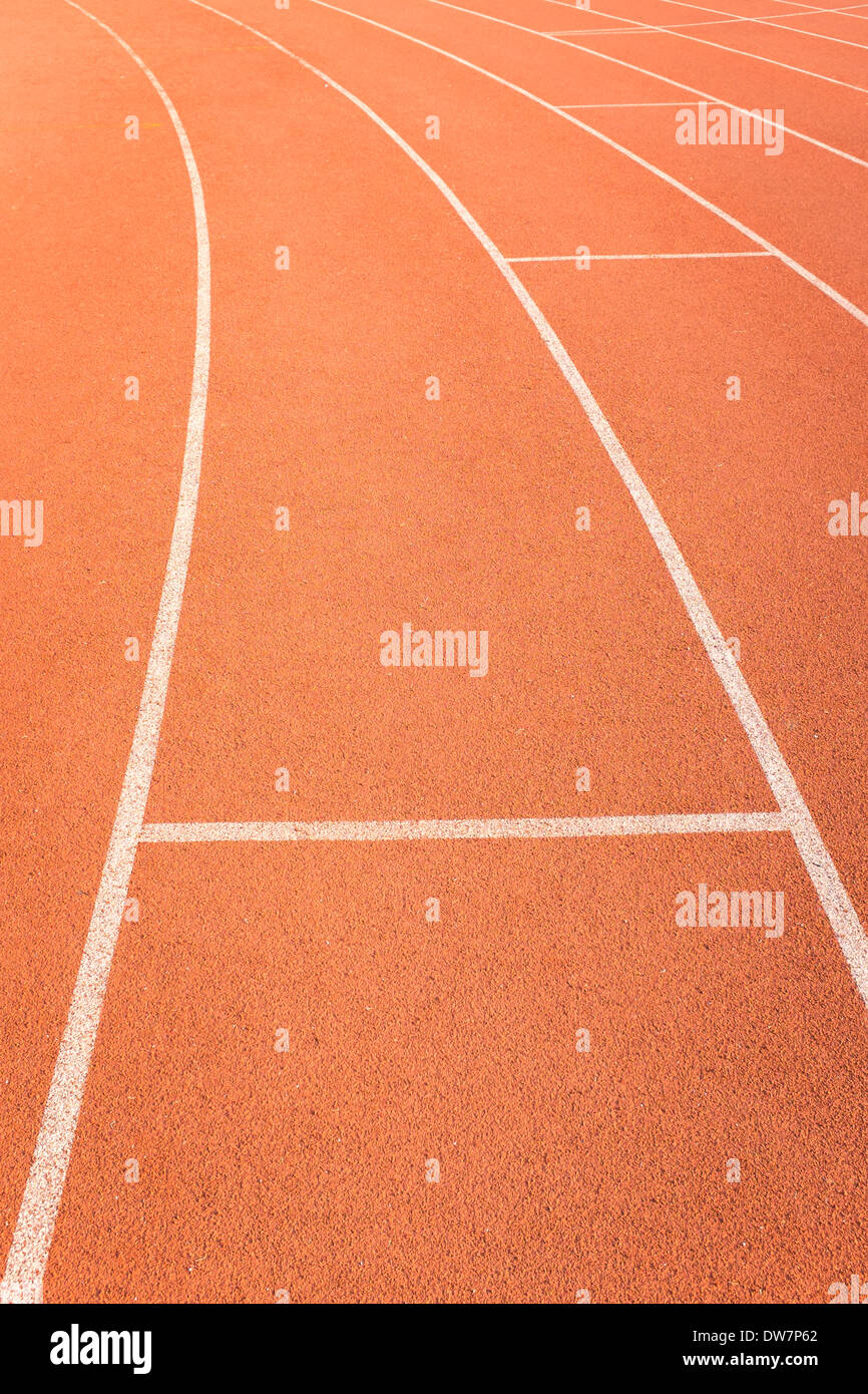 red color and texture of athletics track lanes with white line Stock ...