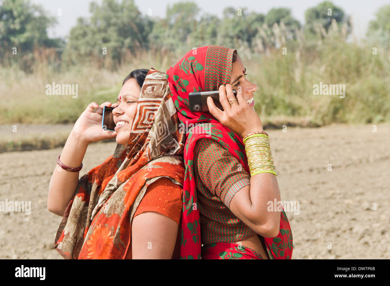 Indian woman talking with mobile Stock Photo - Alamy