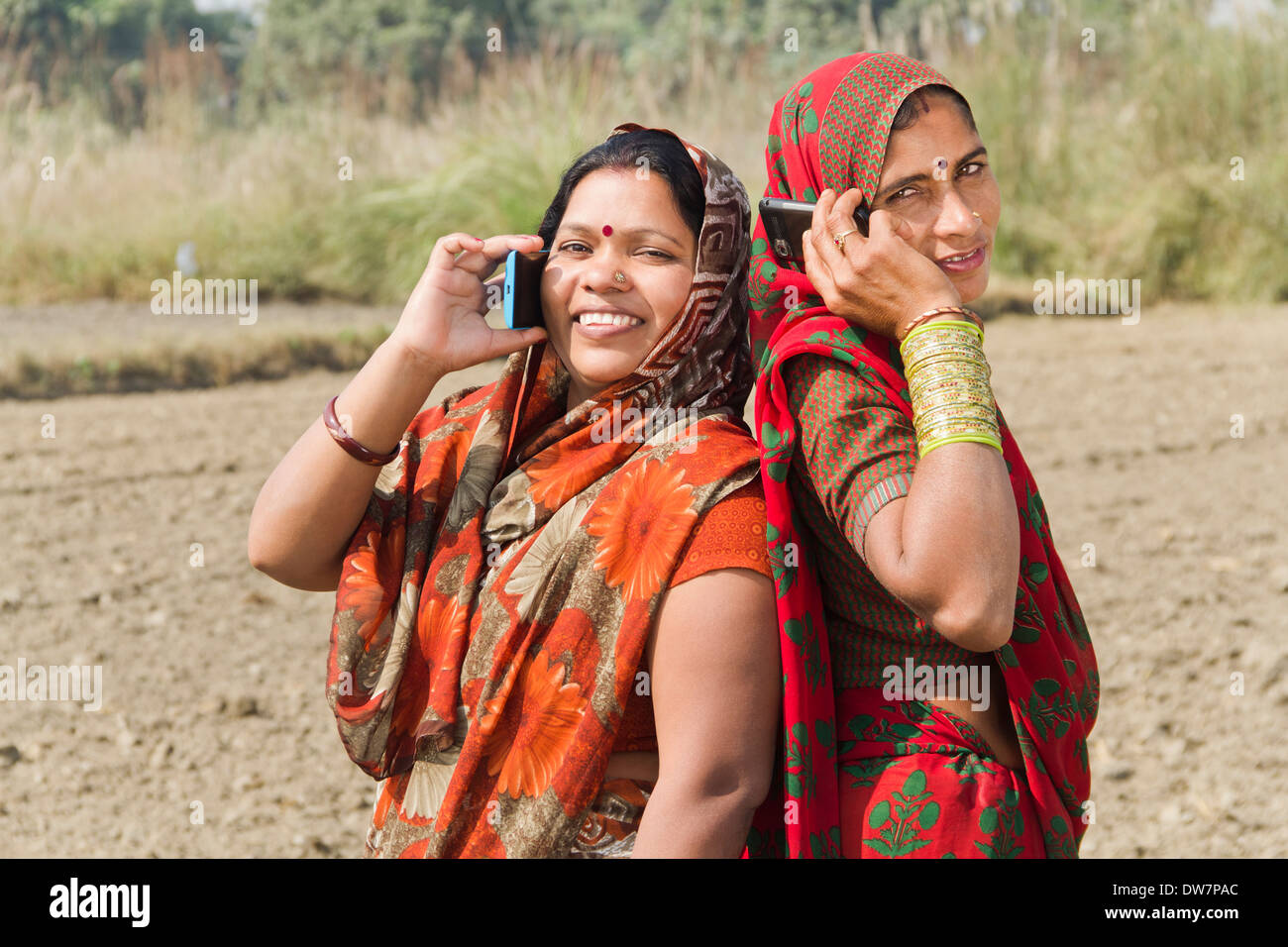 Indian woman talking with mobile Stock Photo - Alamy