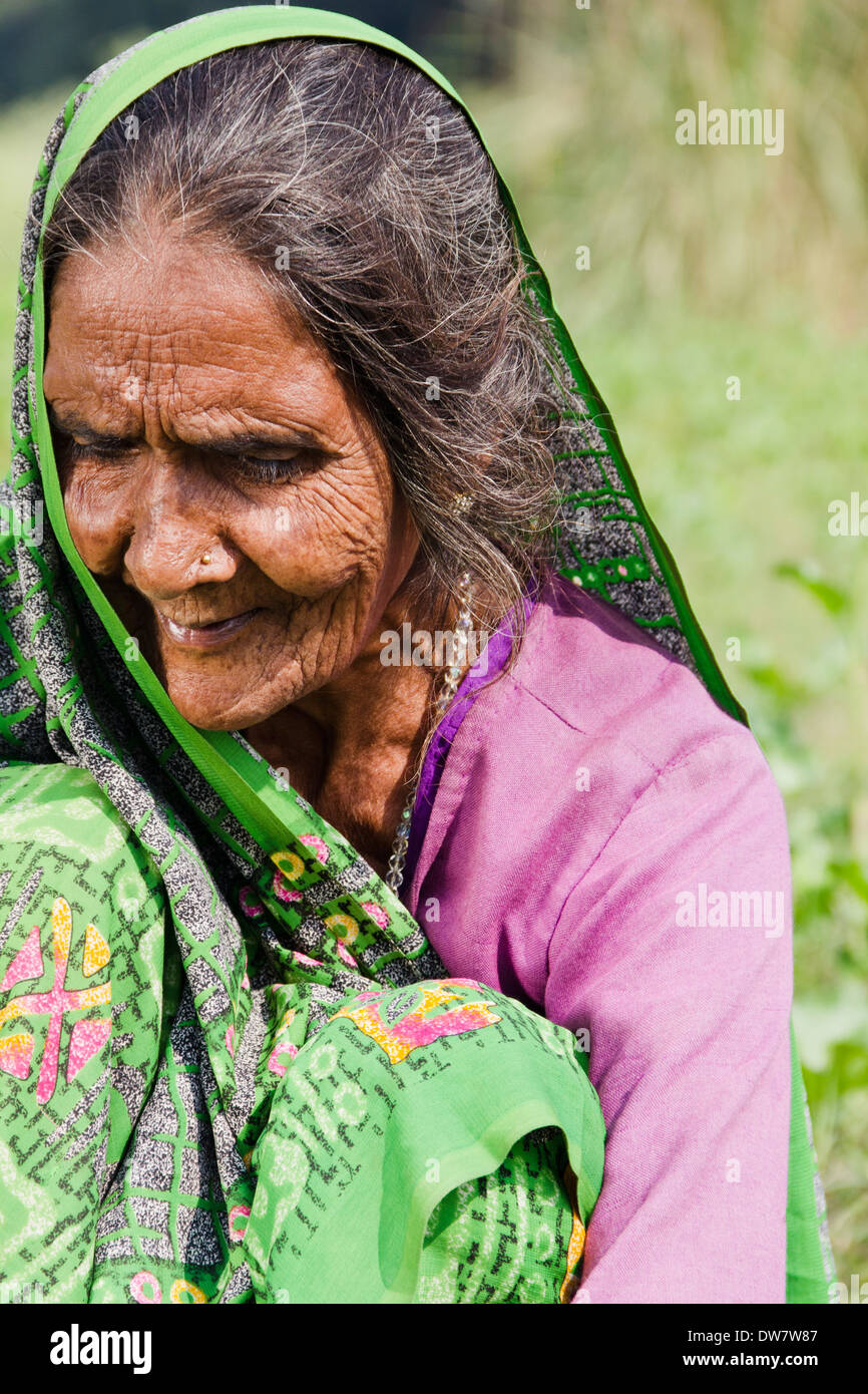 1 Indian woman working in farm Stock Photo - Alamy