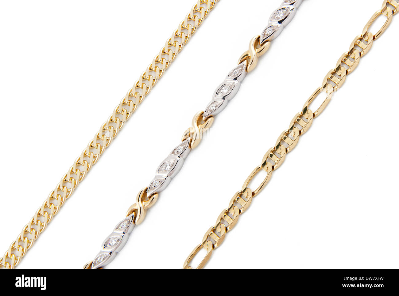 Gold jewelry on a white background Stock Photo - Alamy