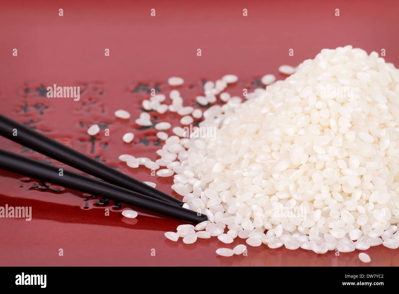 Rice with chopsticks hi-res stock photography and images - Alamy