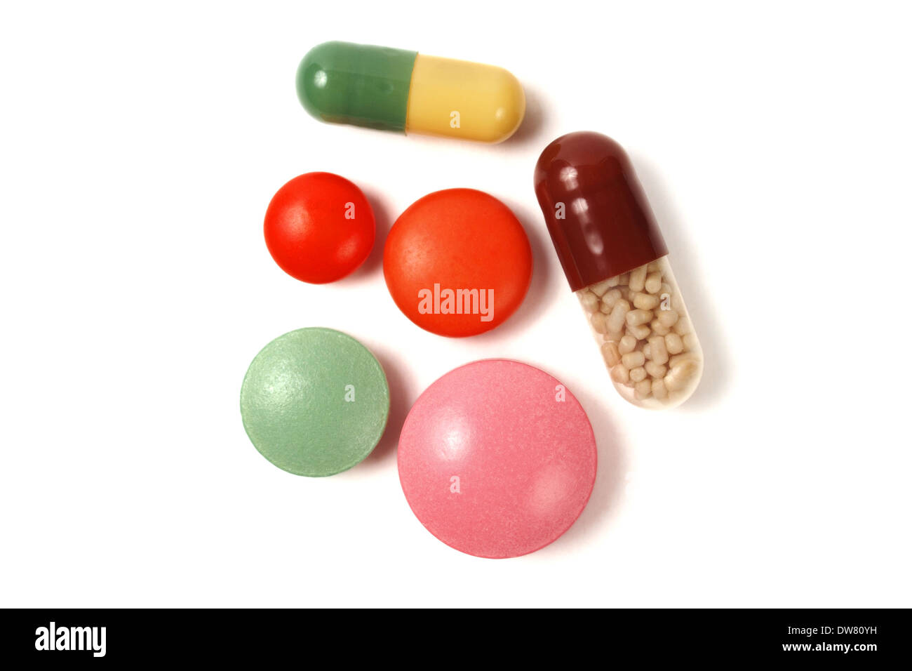 Macro of pills and capsules isolated on white background Stock Photo ...