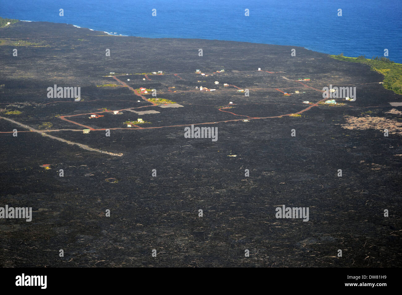 Aerial view of the city of Kalapana, inside an active lava field, Big ...