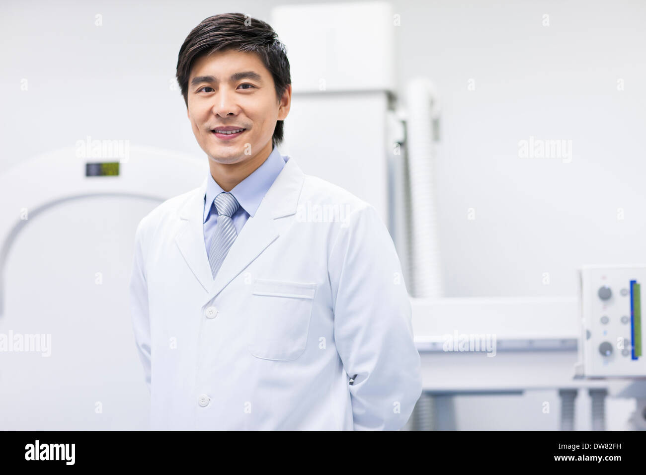 Doctor with x-ray equipment Stock Photo - Alamy