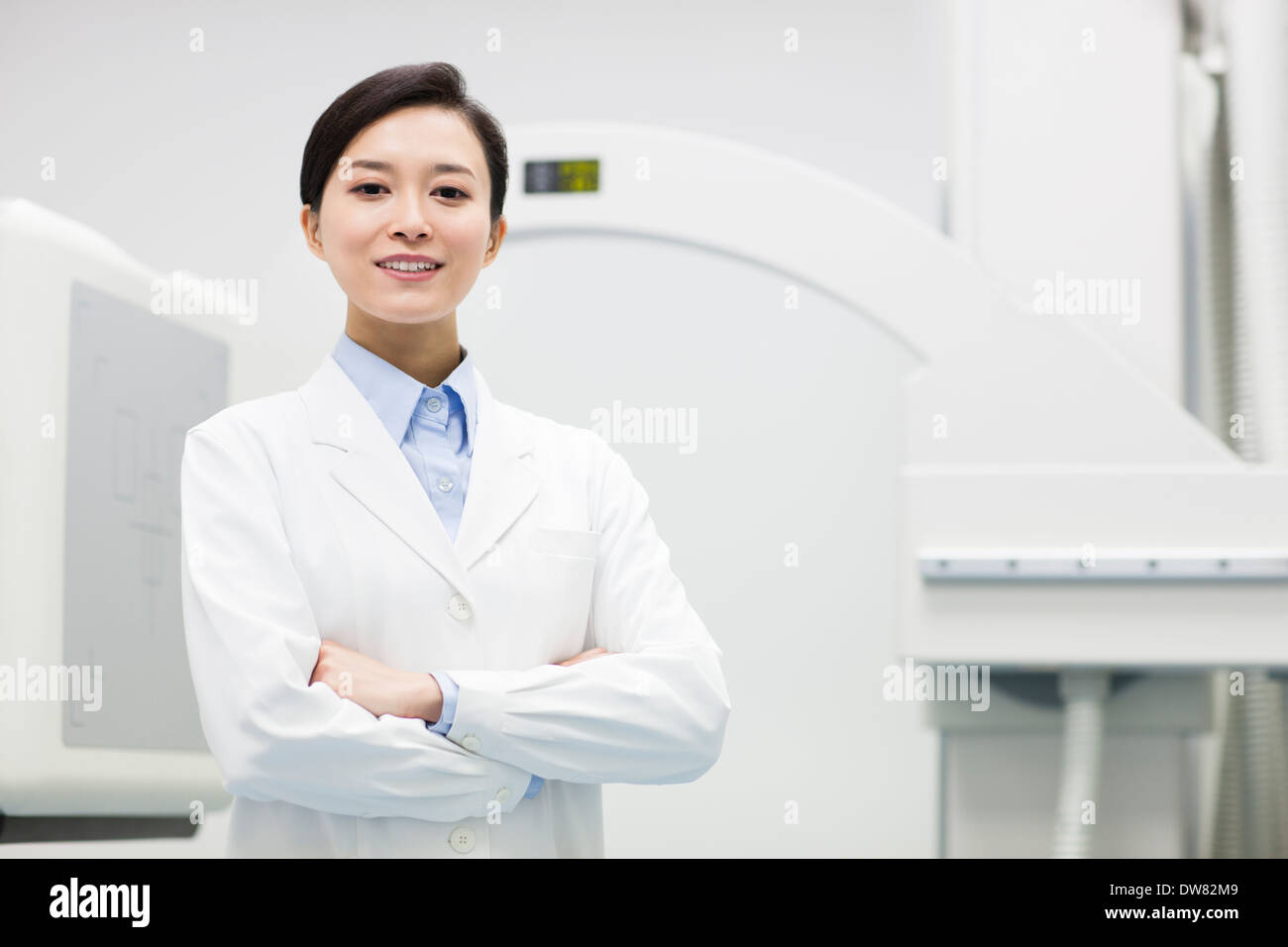 Doctor with x-ray equipment Stock Photo - Alamy