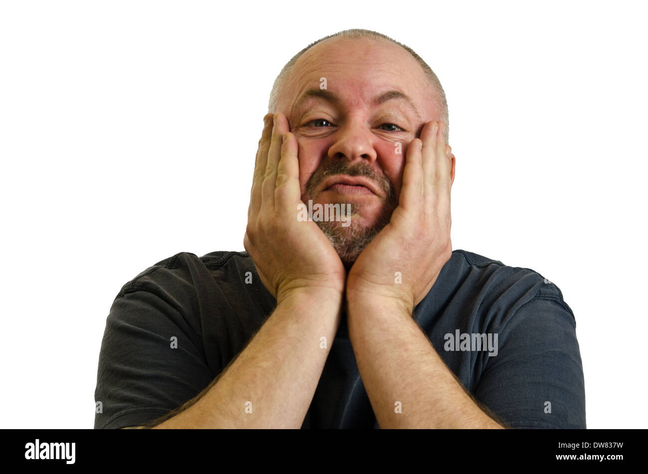 Bald headed man looking fed up Stock Photo - Alamy