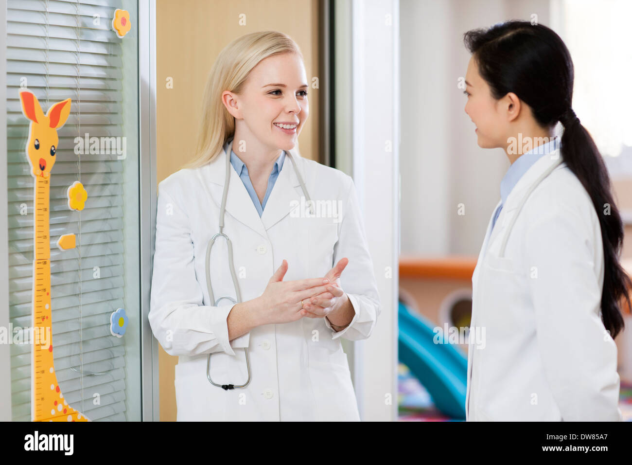 Doctors in children's hospital Stock Photo - Alamy