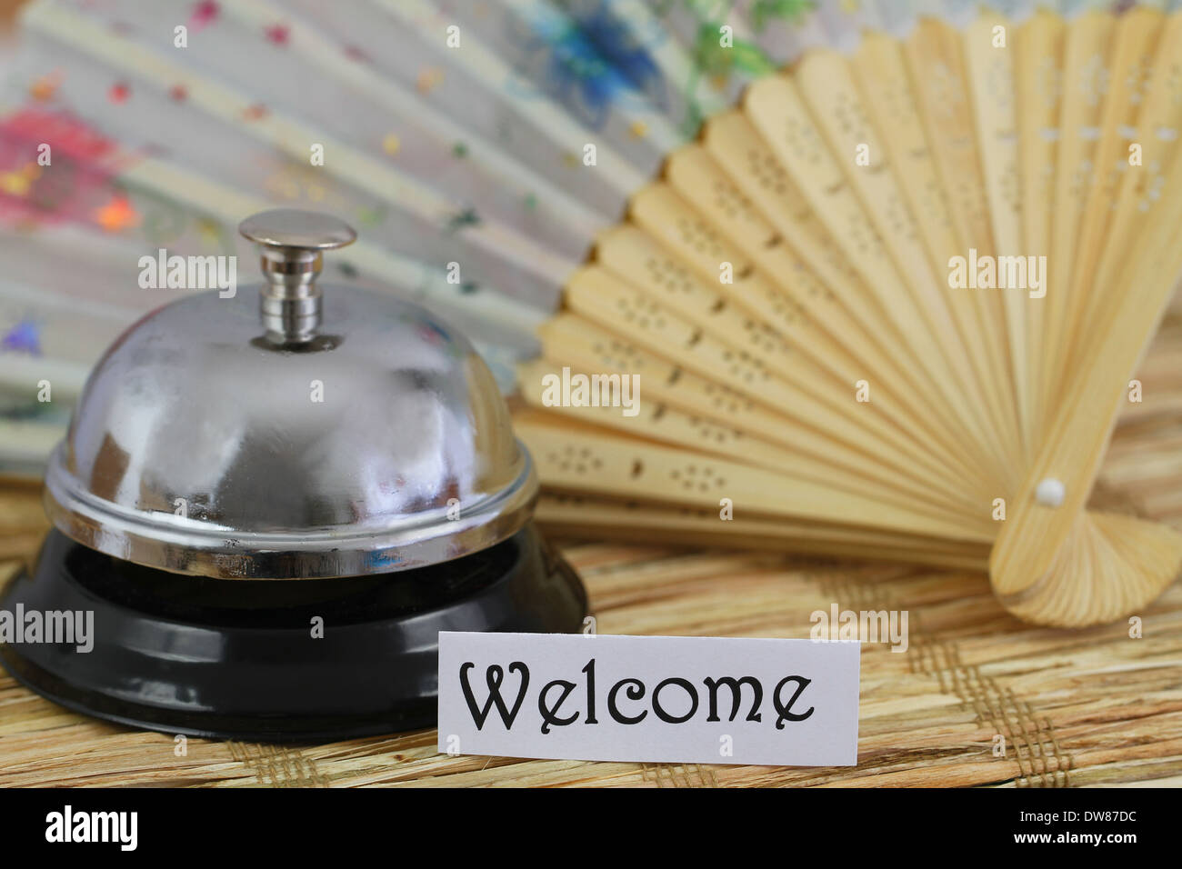 Welcome card with hotel bell Stock Photo - Alamy