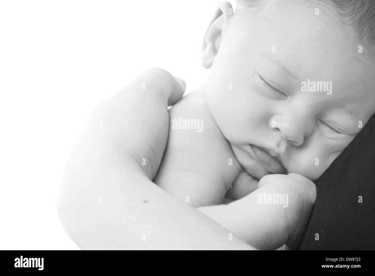 happy newborn baby girl just a week old photographed in the studio ...
