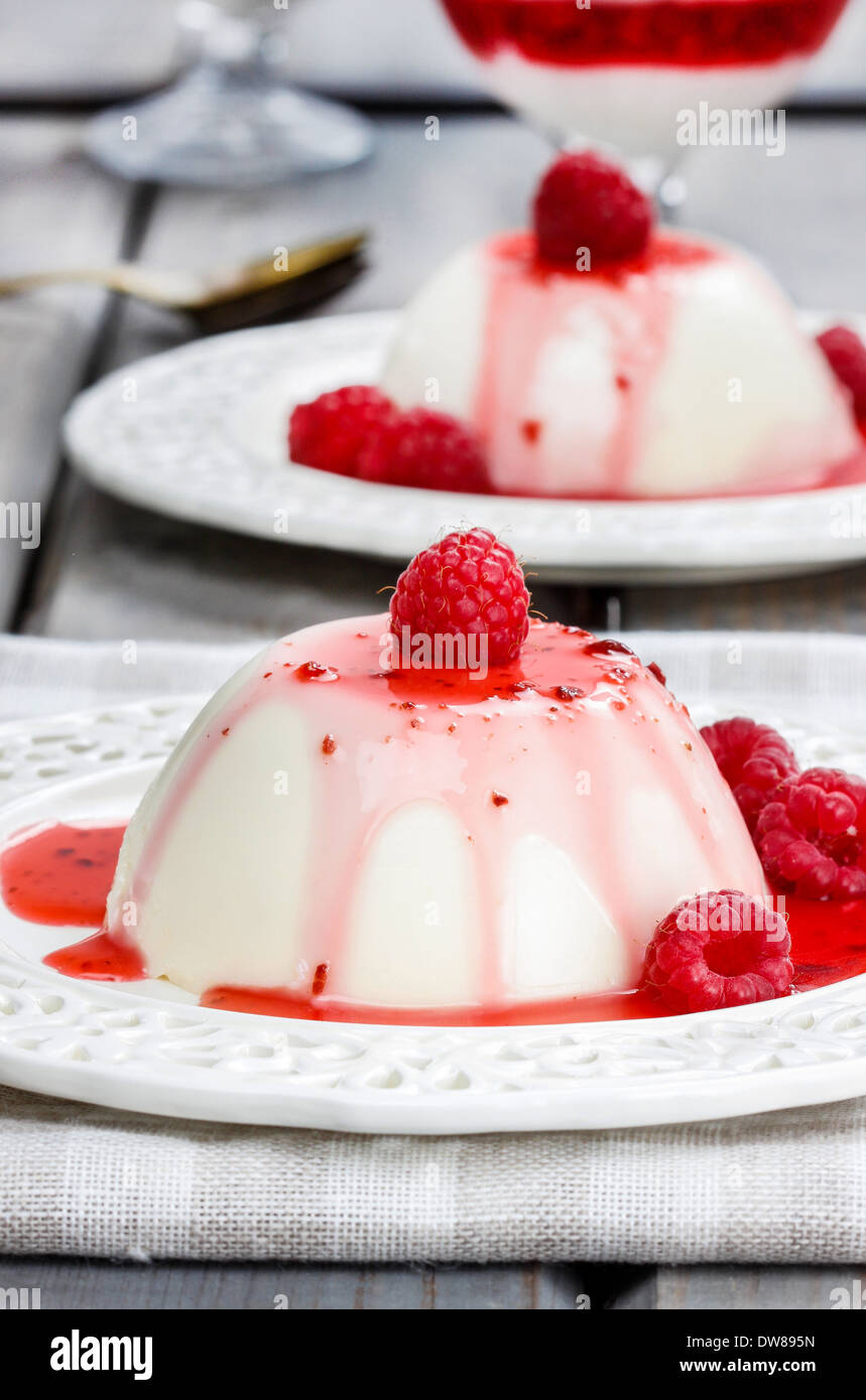 Flan with raspberry sauce and fresh fruitsFlan with raspberry sauce and ...