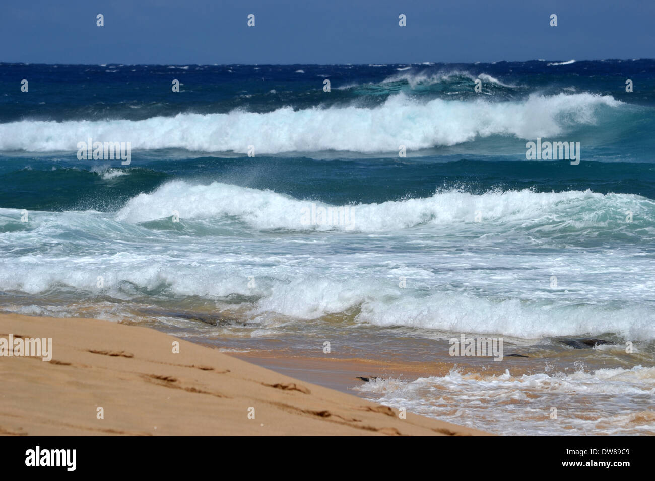 Sandy beach ocean waves hi-res stock photography and images - Alamy