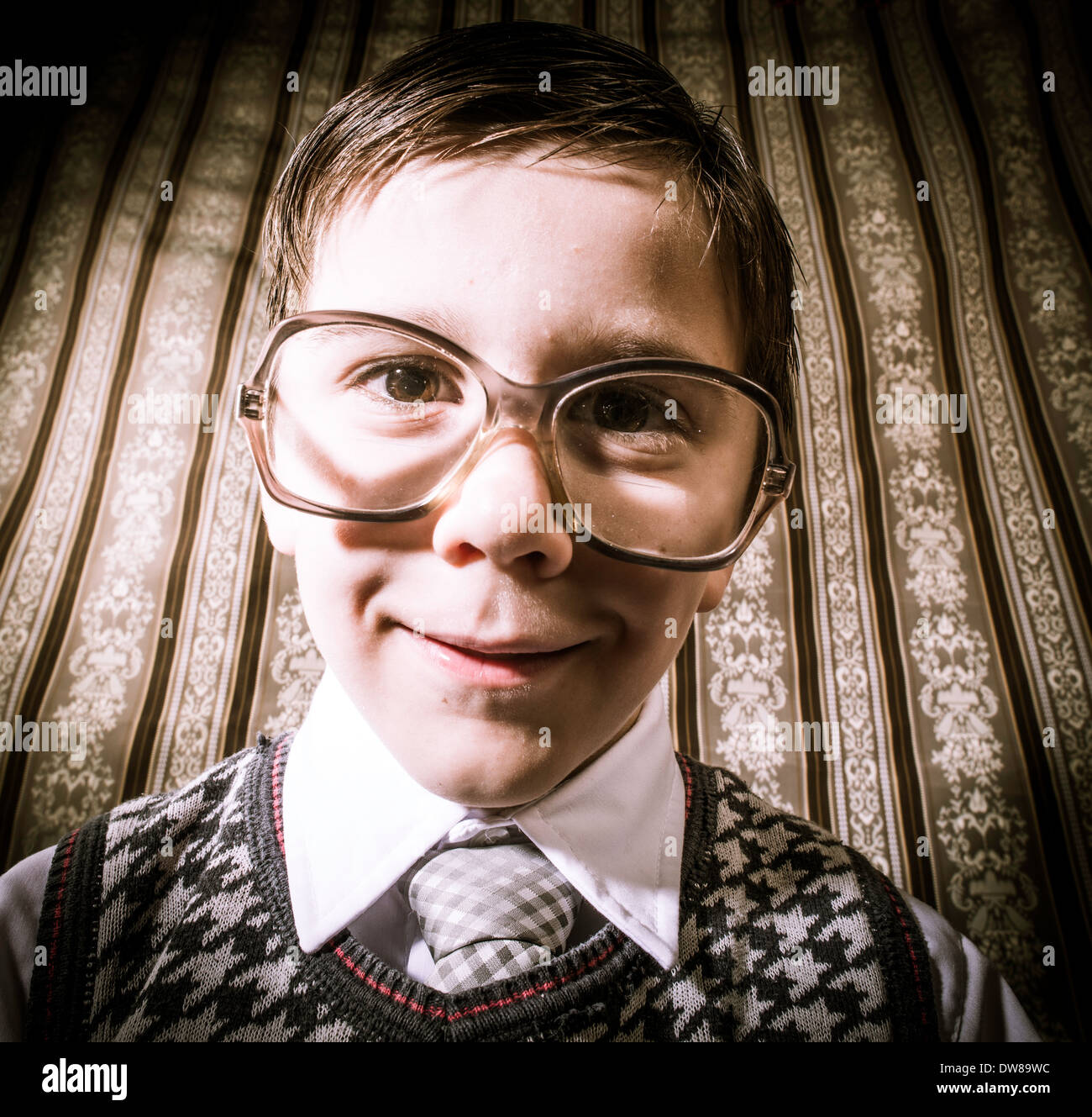 Smiling child with glasses in vintage clothes. Close up shot Stock ...
