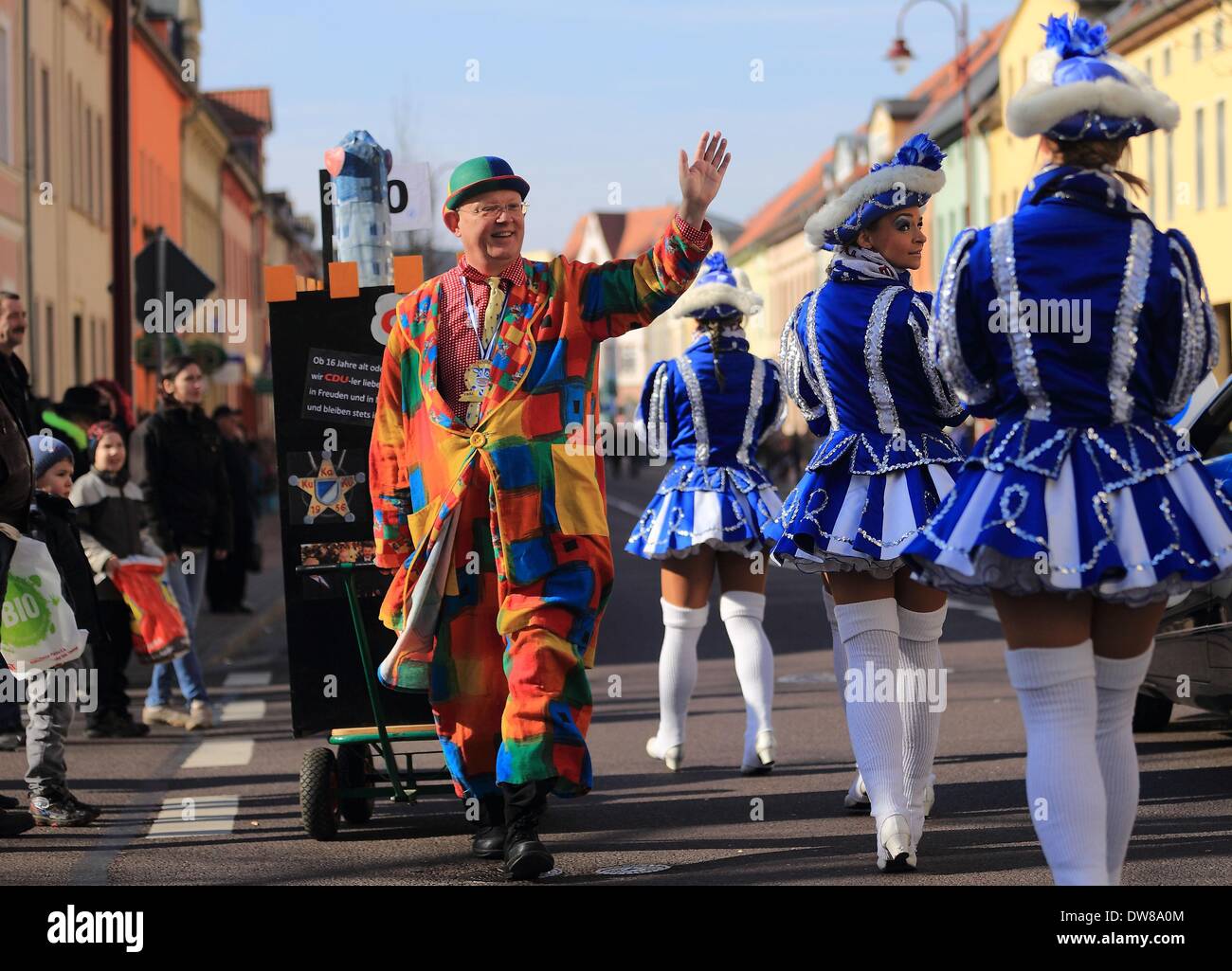 Koethen, Germany. 03rd Mar, 2014. A man dressed as a clown waves during ...