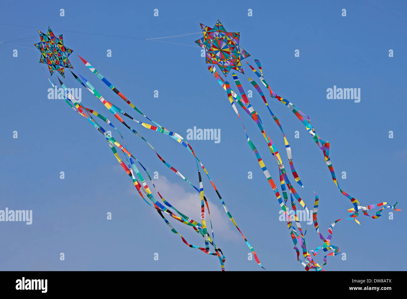 Multi colored kites riding the breeze Stock Photo - Alamy