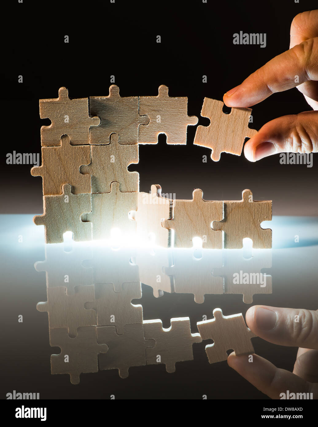 Holding puzzle piece hi-res stock photography and images - Alamy